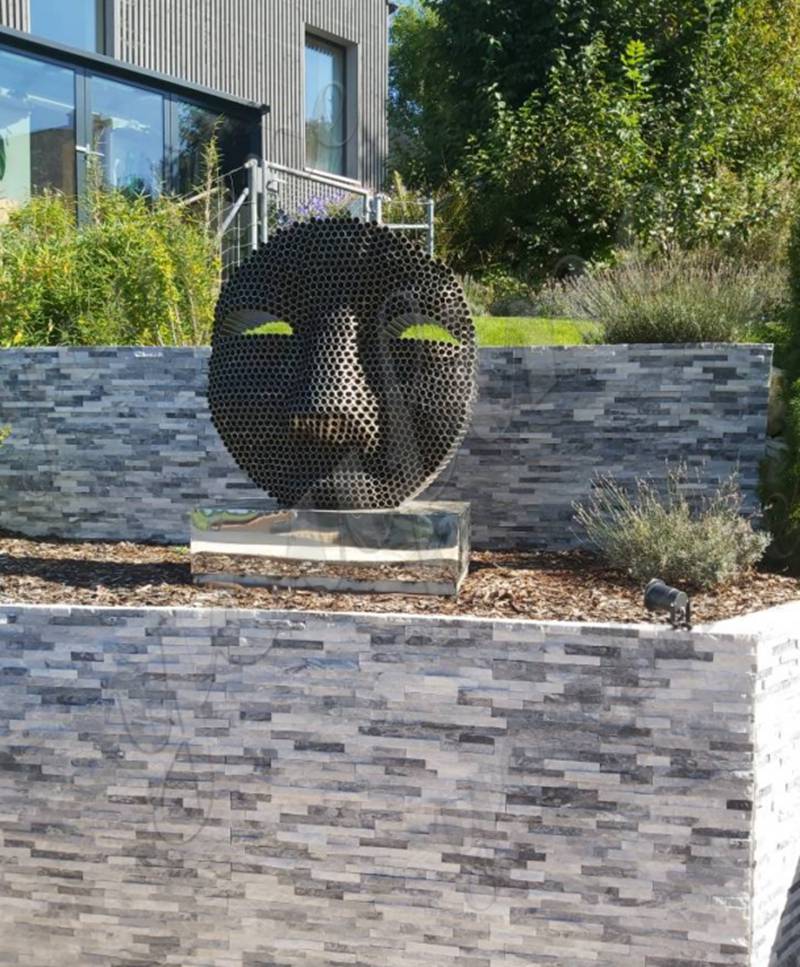 Modern Metal Pipe Faces Sculpture